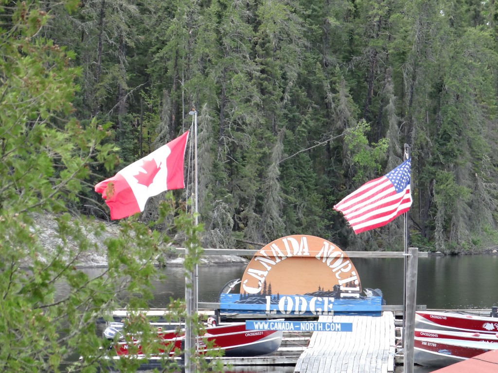 Flags at beginning of the Dock - Canada North Lodge